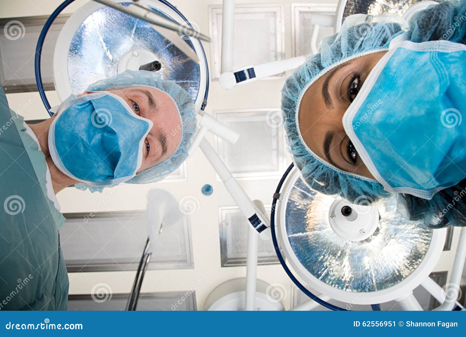 Surgeons looking down stock image. Image of cure, doctor - 62556951