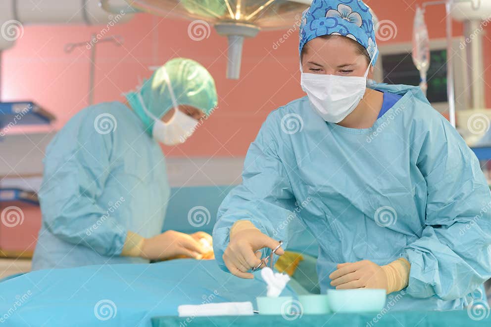 Surgeons Operate on Patient Stock Photo - Image of operating, male ...