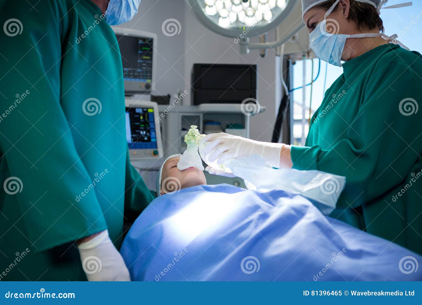Surgeons operating patient stock image. Image of health - 81396465