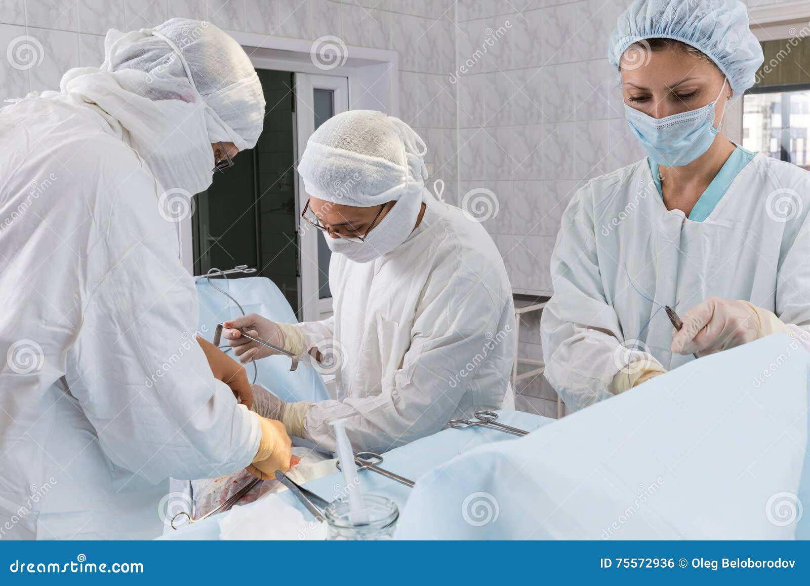 Surgeons in the Operating Room Stock Photo - Image of hands, patient ...