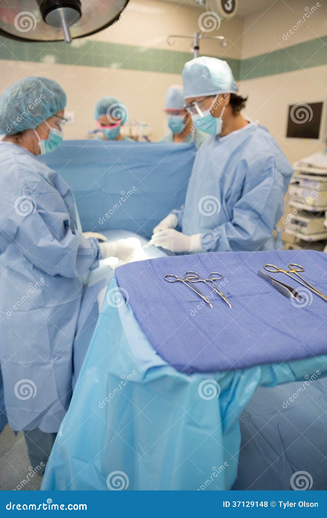 Surgeons Operating in Surgical Theater Stock Photo - Image of ...