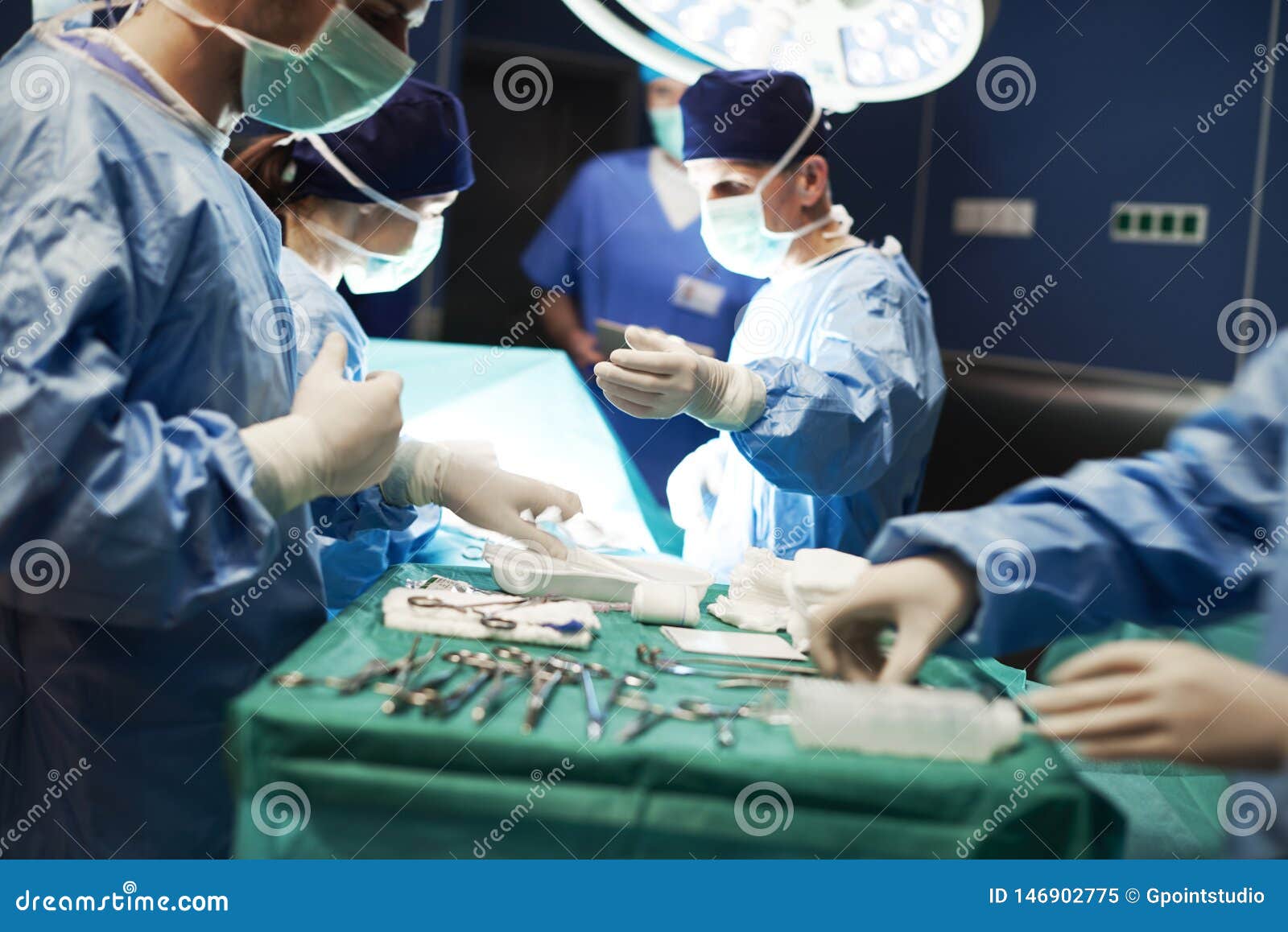 Surgeons Passing Basic, Surgical Equipment To Each Other Stock Image ...