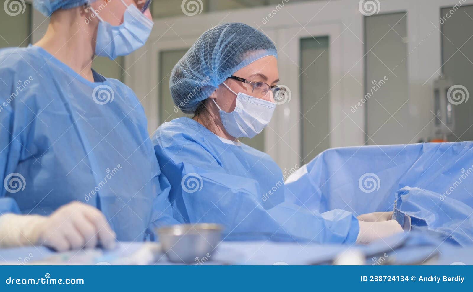 Surgeons Perform a Complex Operation on an Elderly Woman on the ...