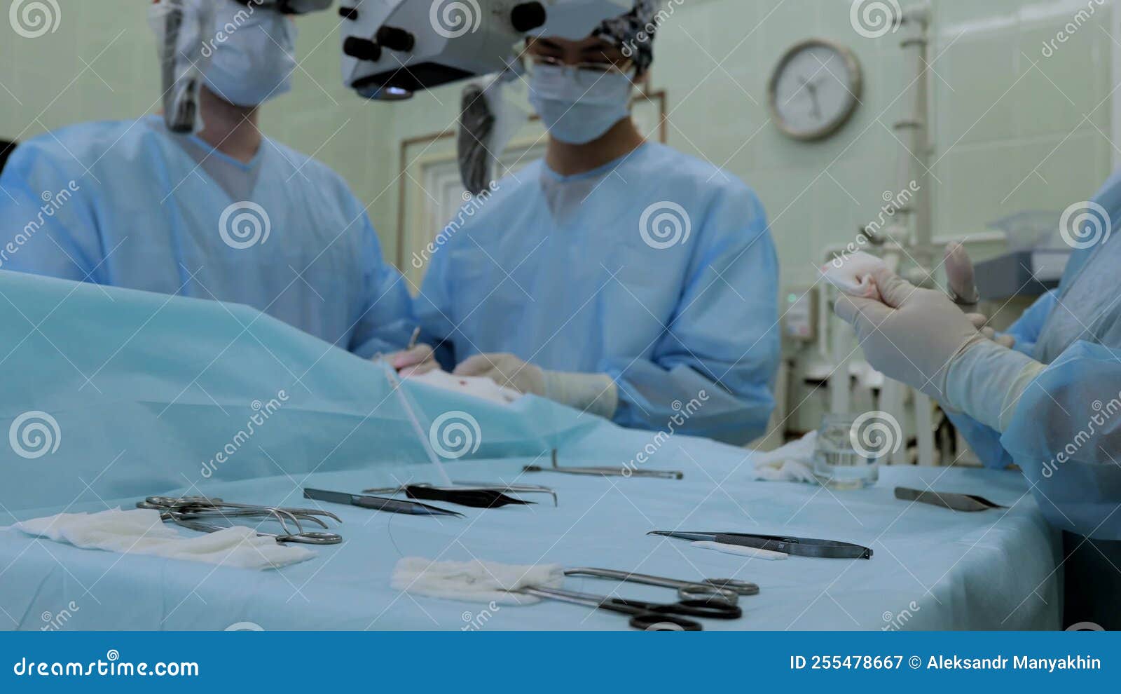 Surgeons Perform a Complex Operation Using a Microscope Stock Video ...