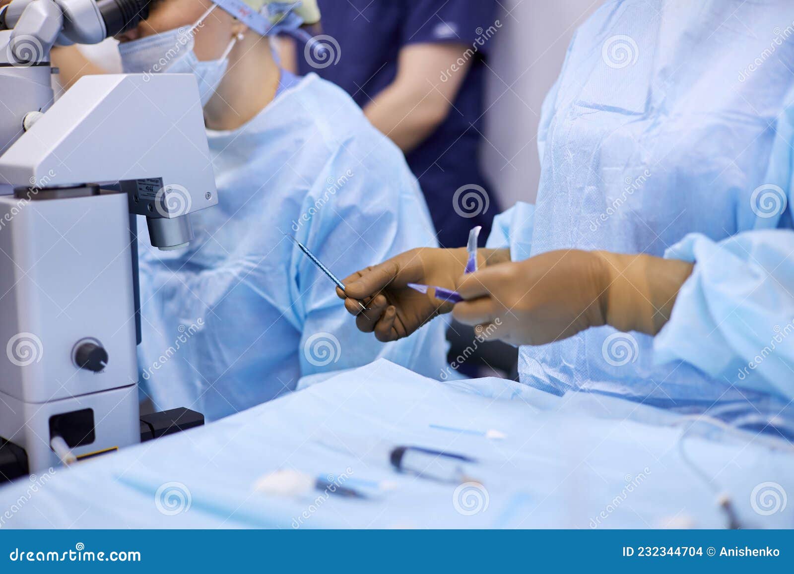 Surgeons Performing Eye Surgery in the Operating Room Stock Photo ...
