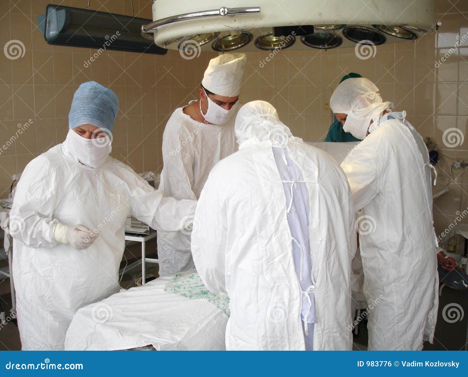 Surgeons Performing Operation. Stock Photo - Image of hospital ...