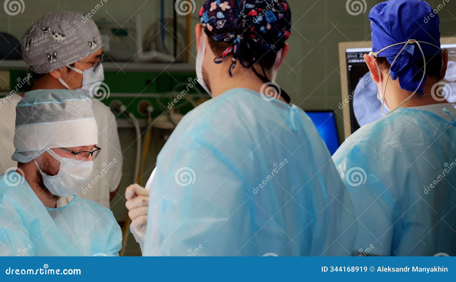 Surgeons Conducting a Surgical Procedure in a Sterile Operating Room ...