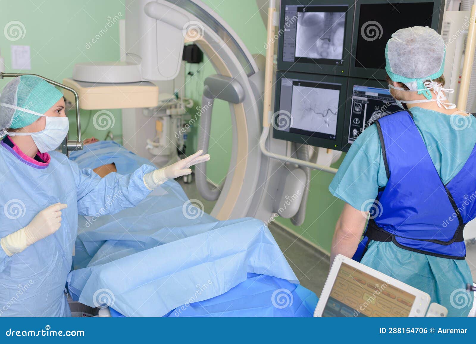 Surgeons Performing Surgery in Operating Theater Stock Photo - Image of ...