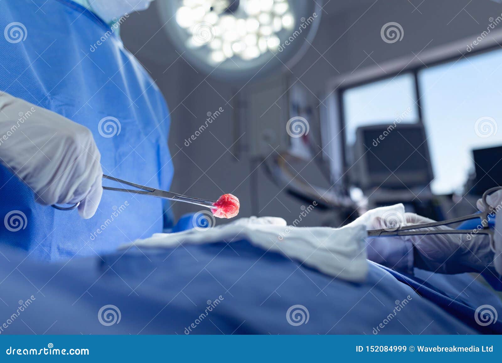 Surgeons Performing Surgery in Operation Room at Hospital Stock Image ...