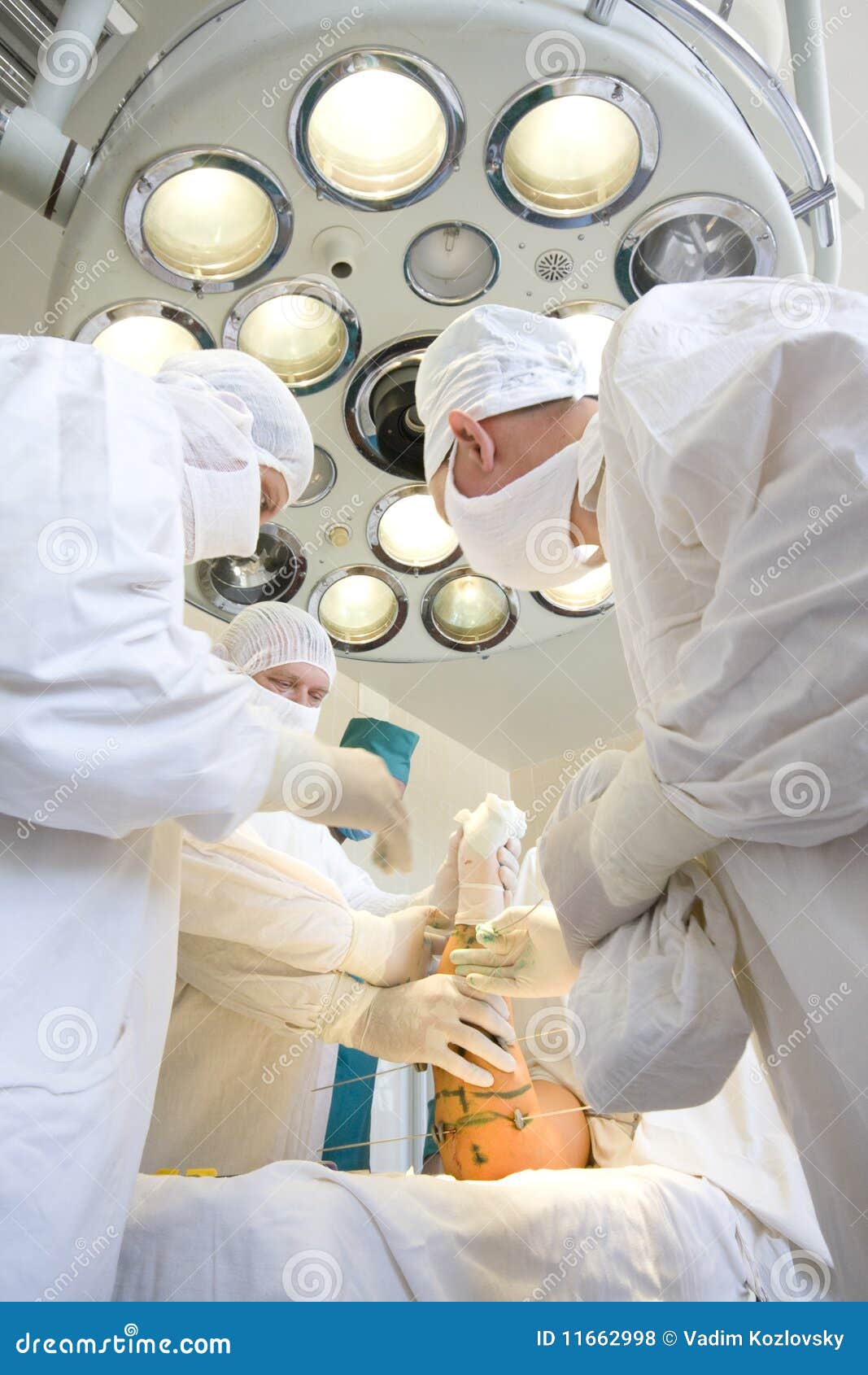 Surgeons team at work stock photo. Image of lamp, care - 11662998