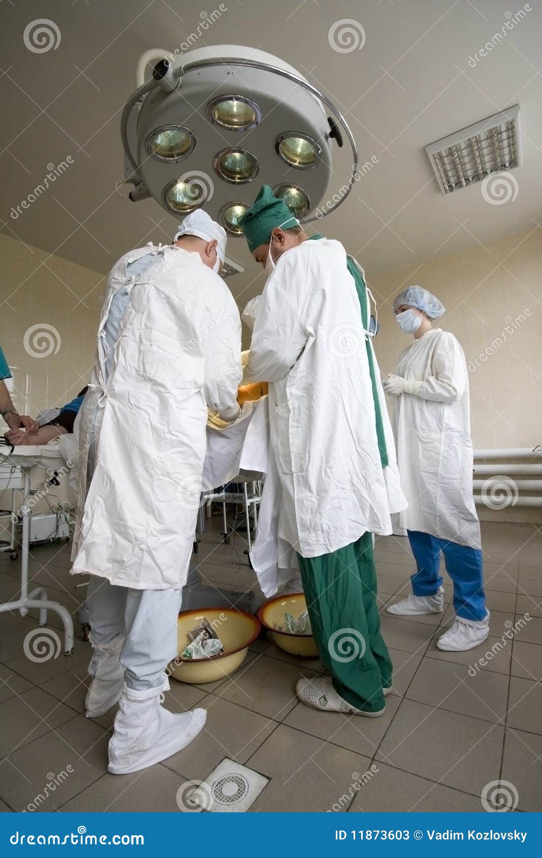 Surgeons team at work stock image. Image of clinic, hospital - 11873603