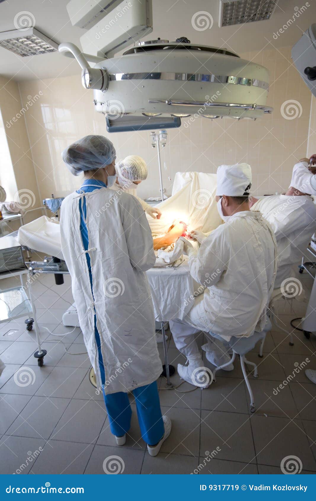 Surgeons team at work stock image. Image of mask, nurse - 9317719