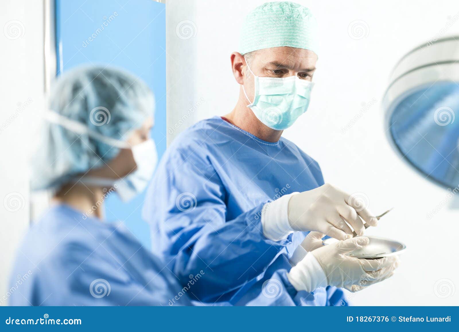 Surgeons at Work stock photo. Image of medical, three - 18267376