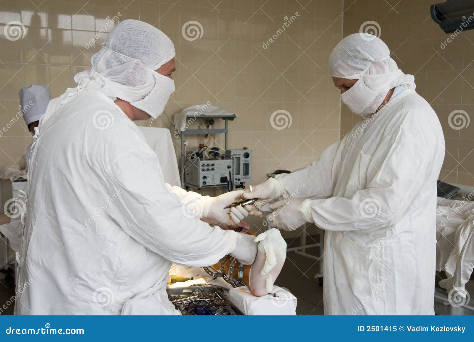 Surgeons at work stock image. Image of gowned, insurance - 2501415