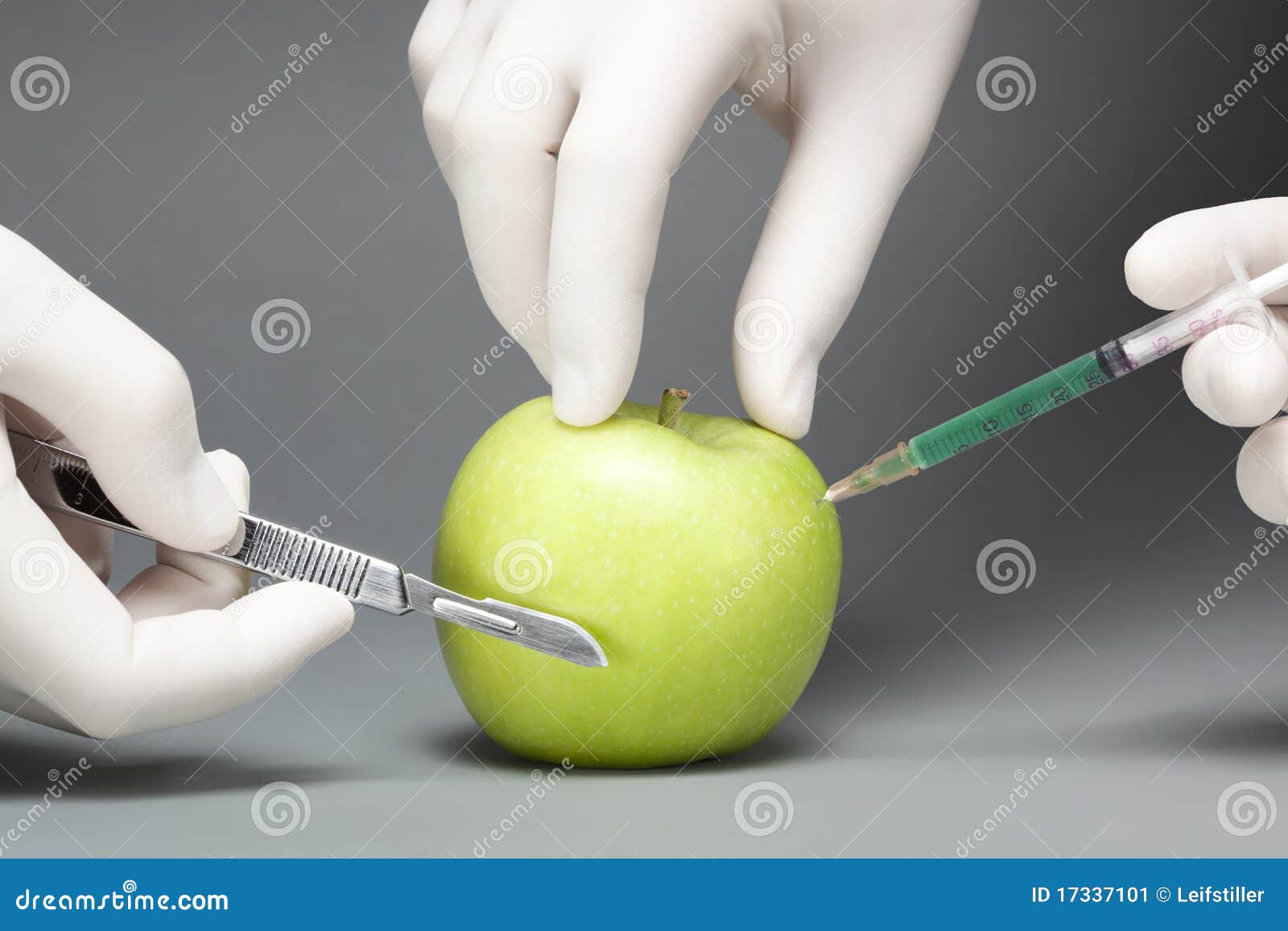 Surgery on an apple stock image. Image of injection, nutrition - 17337101
