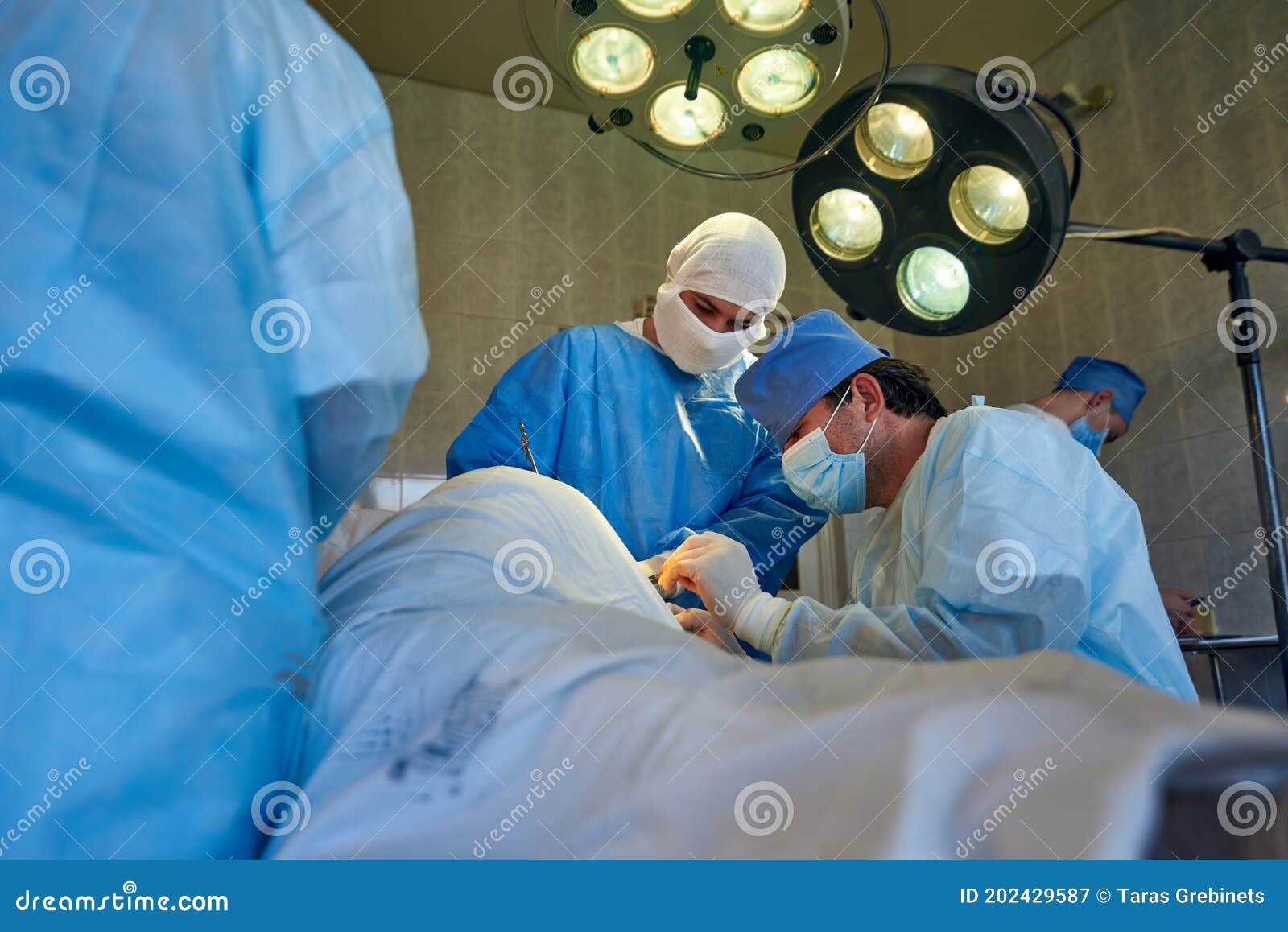 Surgery. Surgery in Progress. Surgeon and His Assistant. Medical ...