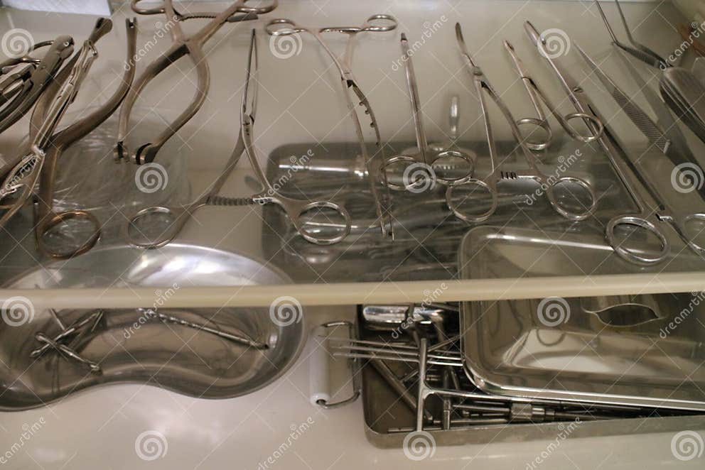 Surgical Instruments on Shelf Stock Photo - Image of needle, tweezers ...