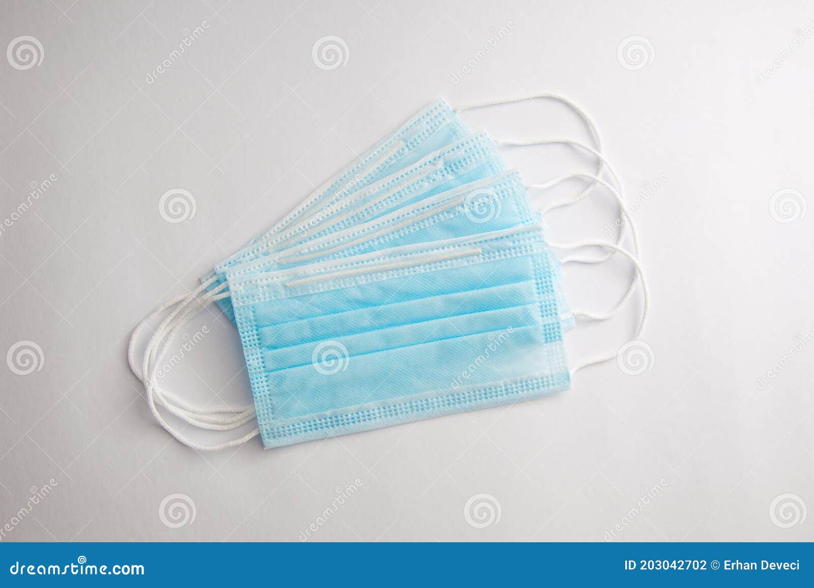 Four Light Blue Surgical Masks Stock Photo - Image of isolated, medical ...
