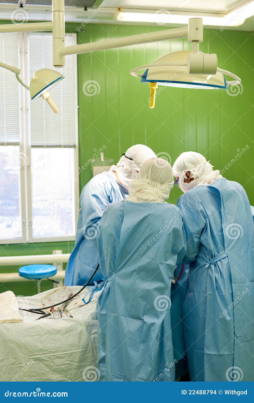 Surgical operation stock photo. Image of lamp, gown, service - 22488794