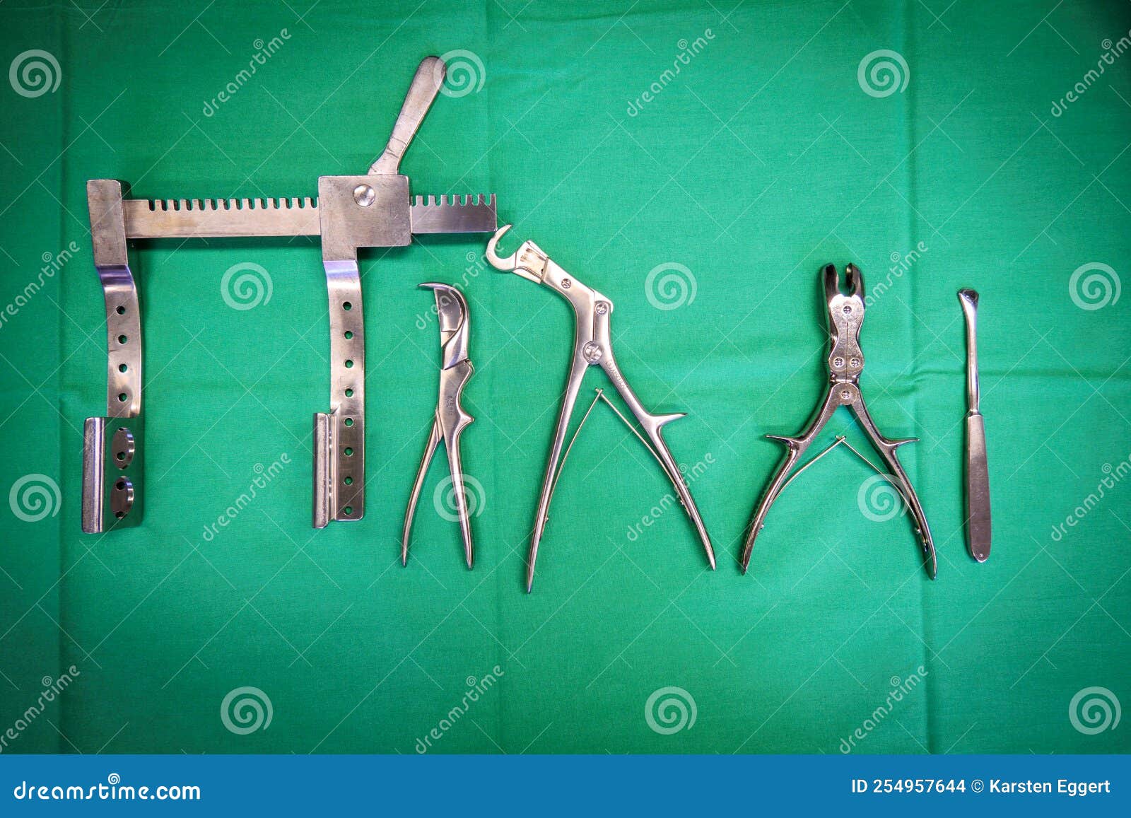 Surgical Rib Instruments Lie on a Green Surgical Cloth Stock Photo ...