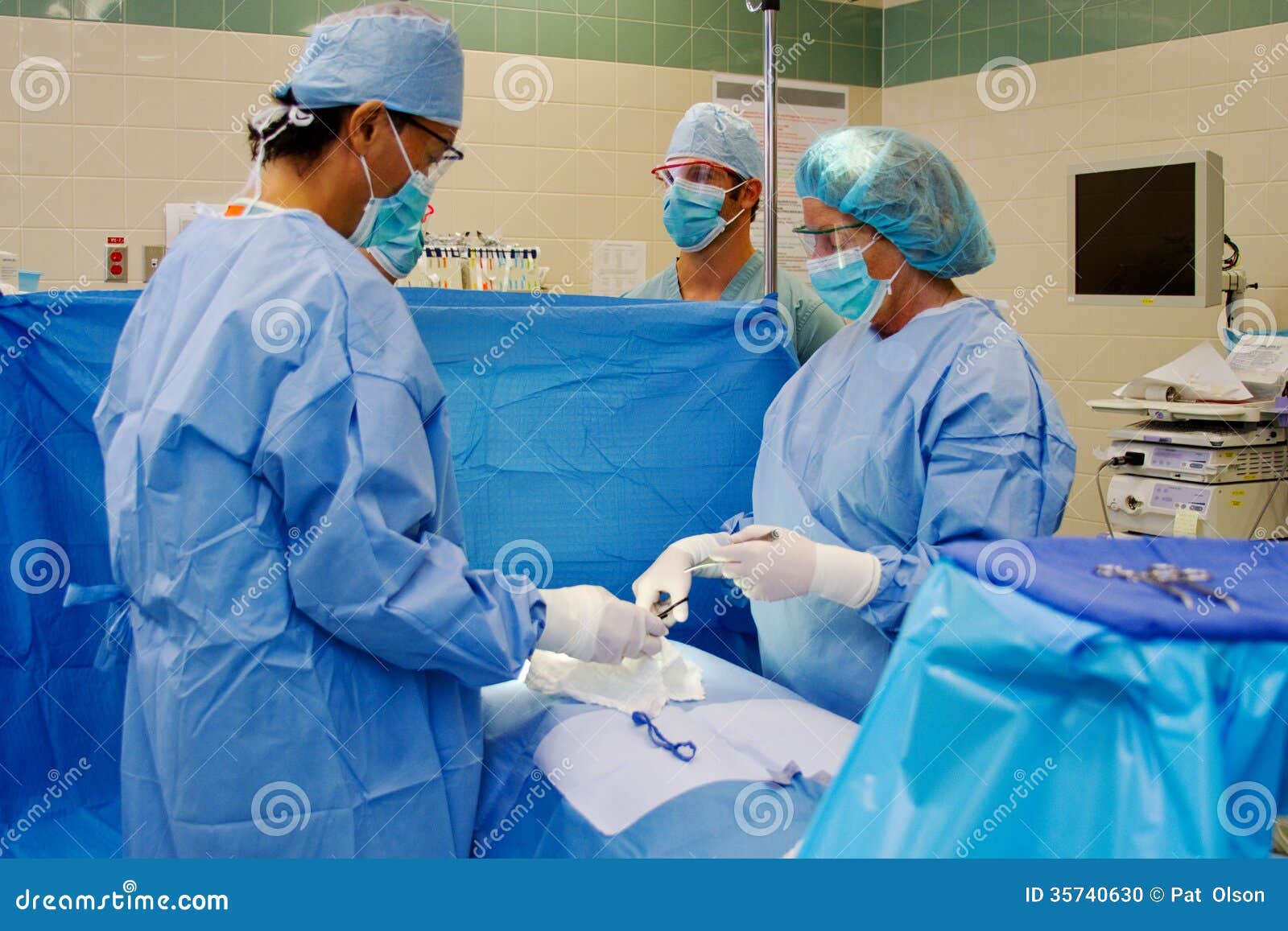 Surgical Team Performing Surgery Stock Photo - Image of hospital ...