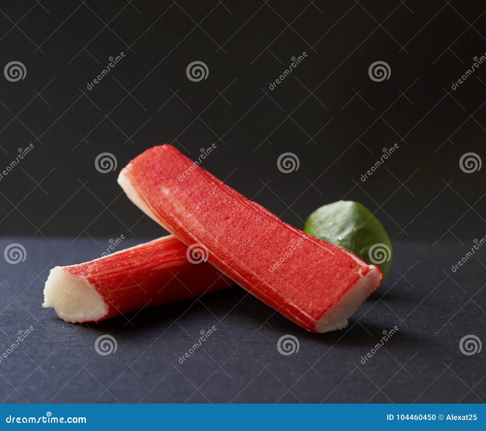 Surimi on black background stock photo. Image of black - 104460450