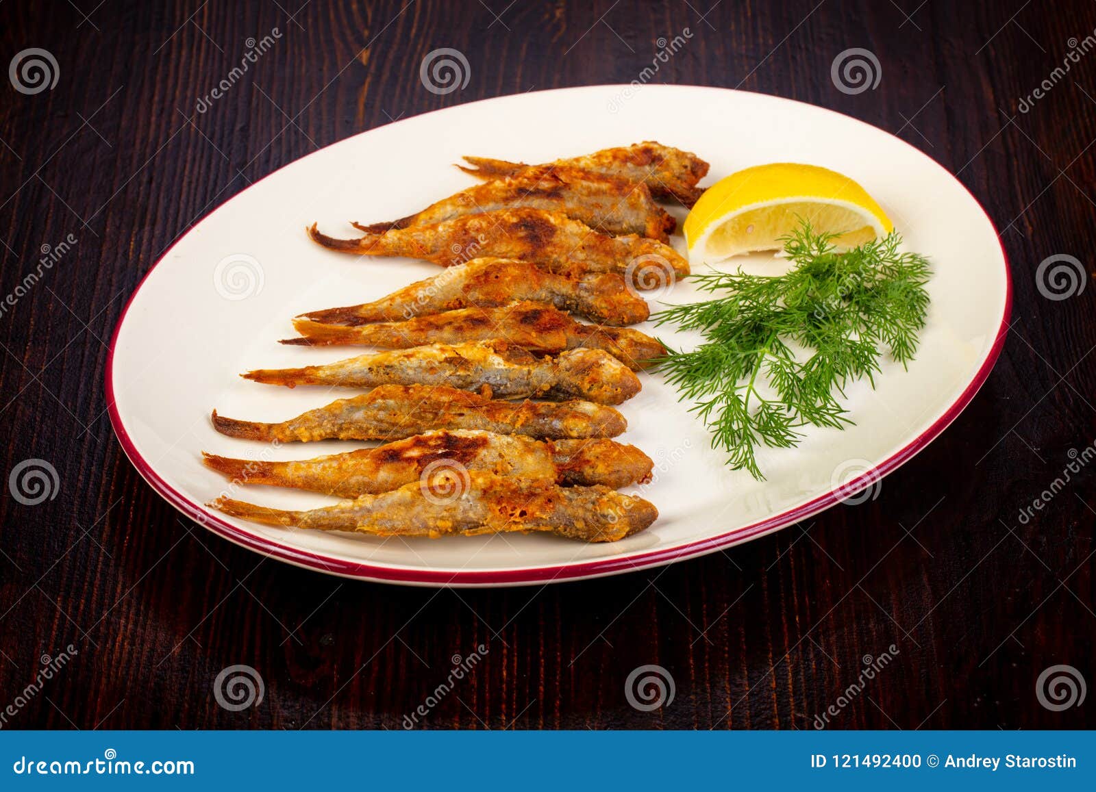 Surmullet fish with lemon stock photo. Image of grilled - 121492400