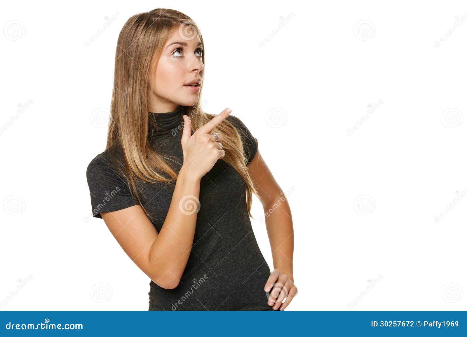 Woman pointing to the side stock photo. Image of pretty - 30257672