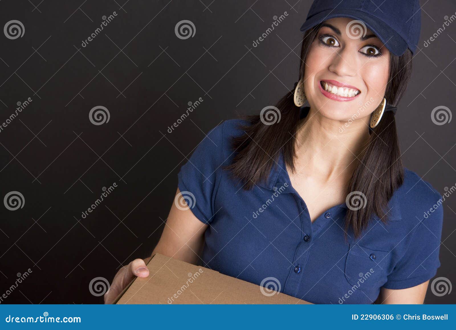 Surprise Delivery Woman in Uniform Brings Packages Stock Photo - Image ...