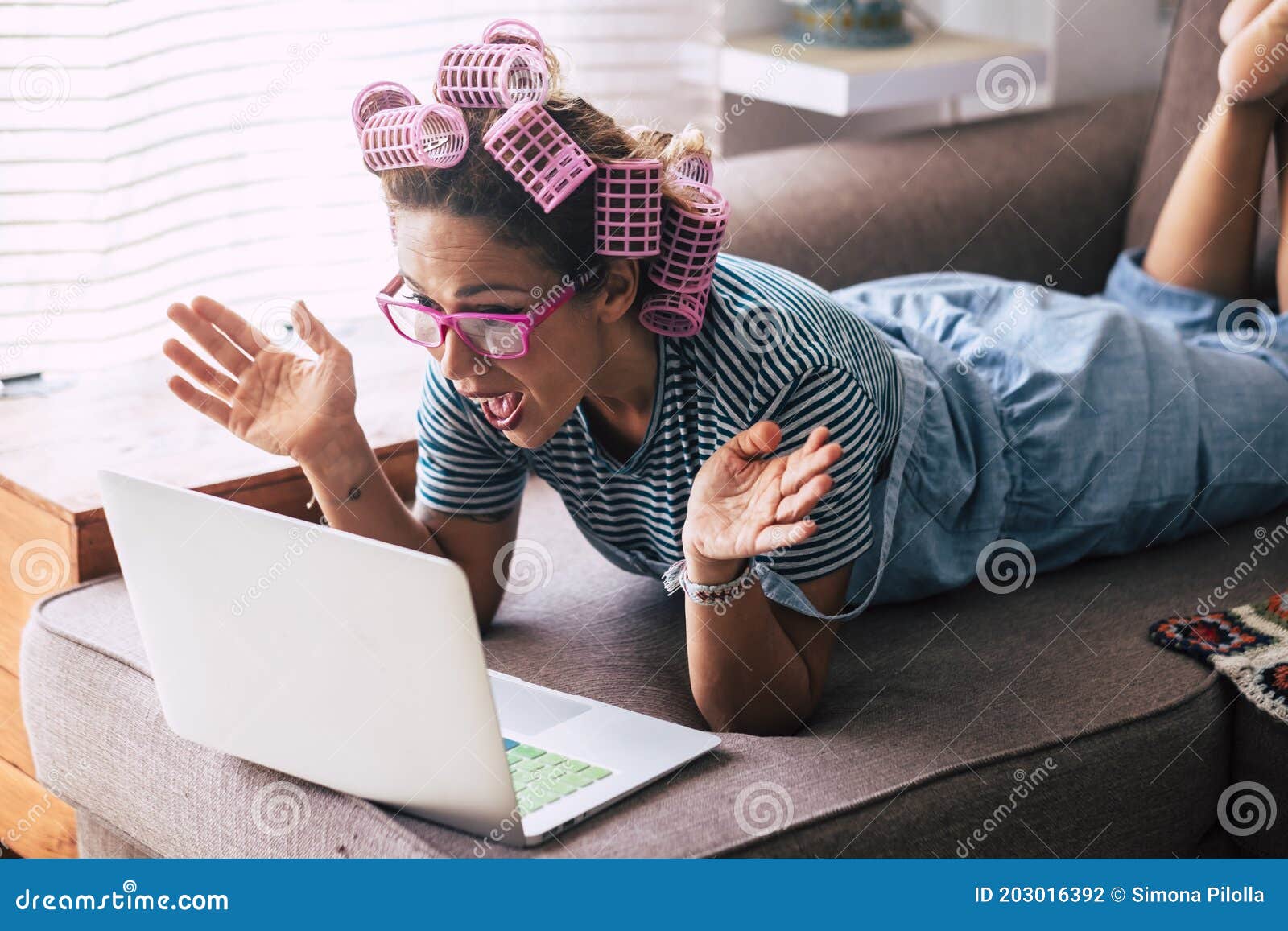 Surprise Happy Joyful Beautiful Woman At Home With Laptop Computer In