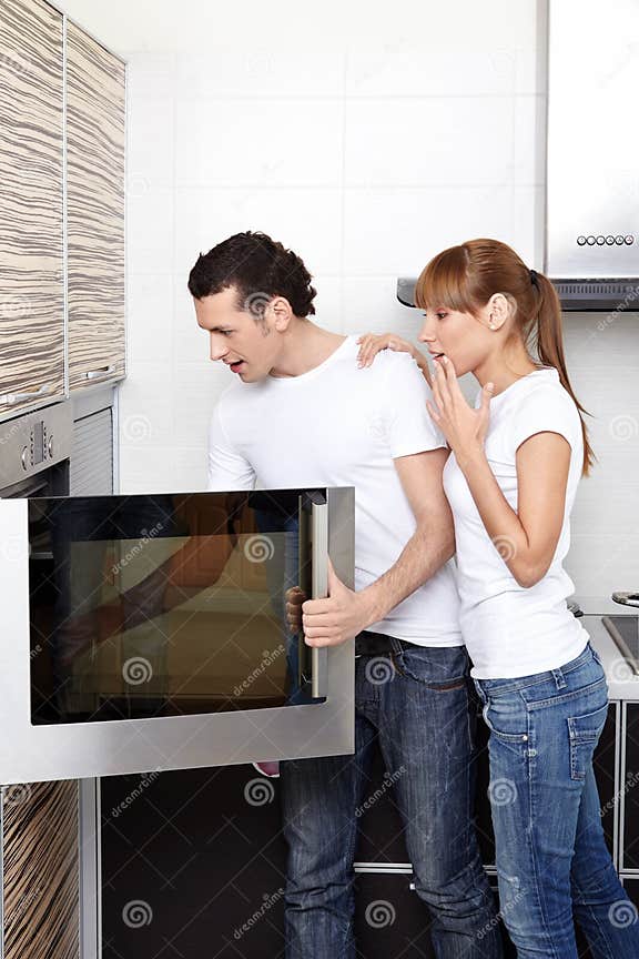 Surprise at kitchen stock image. Image of adult, married - 13798447