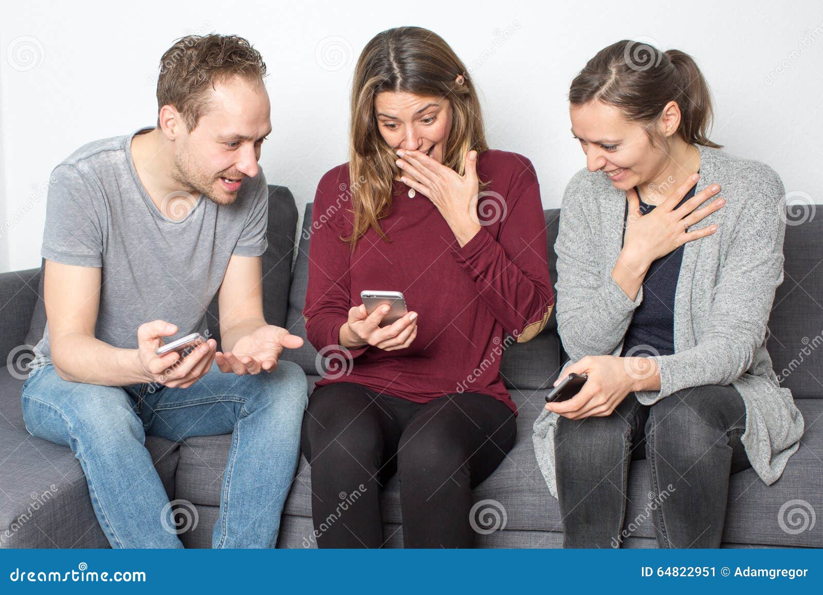 A Surprise between Three Friends Stock Image - Image of look, phone ...