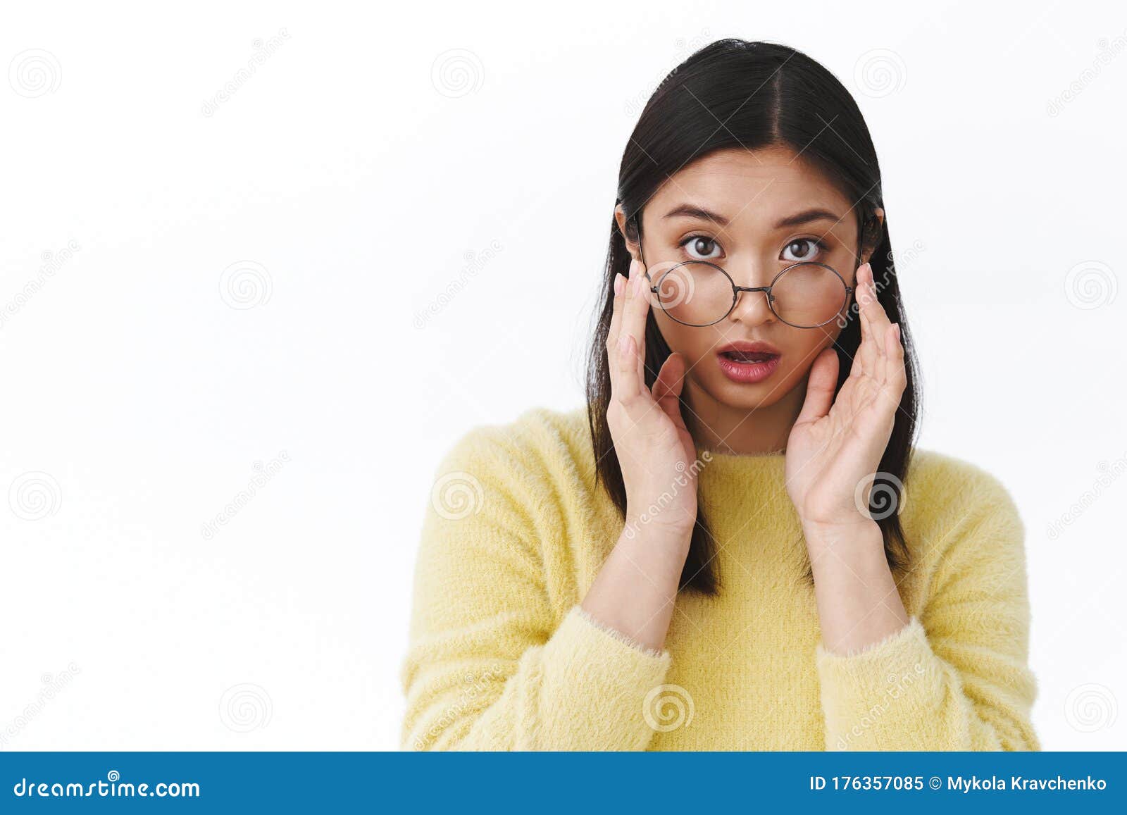 Surprised Asian Girl Drop Jaw And Take Off Glasses Amazed As Hearing
