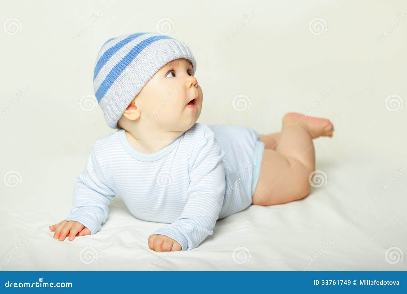 Surprised Baby looking up stock image. Image of girl - 33761749