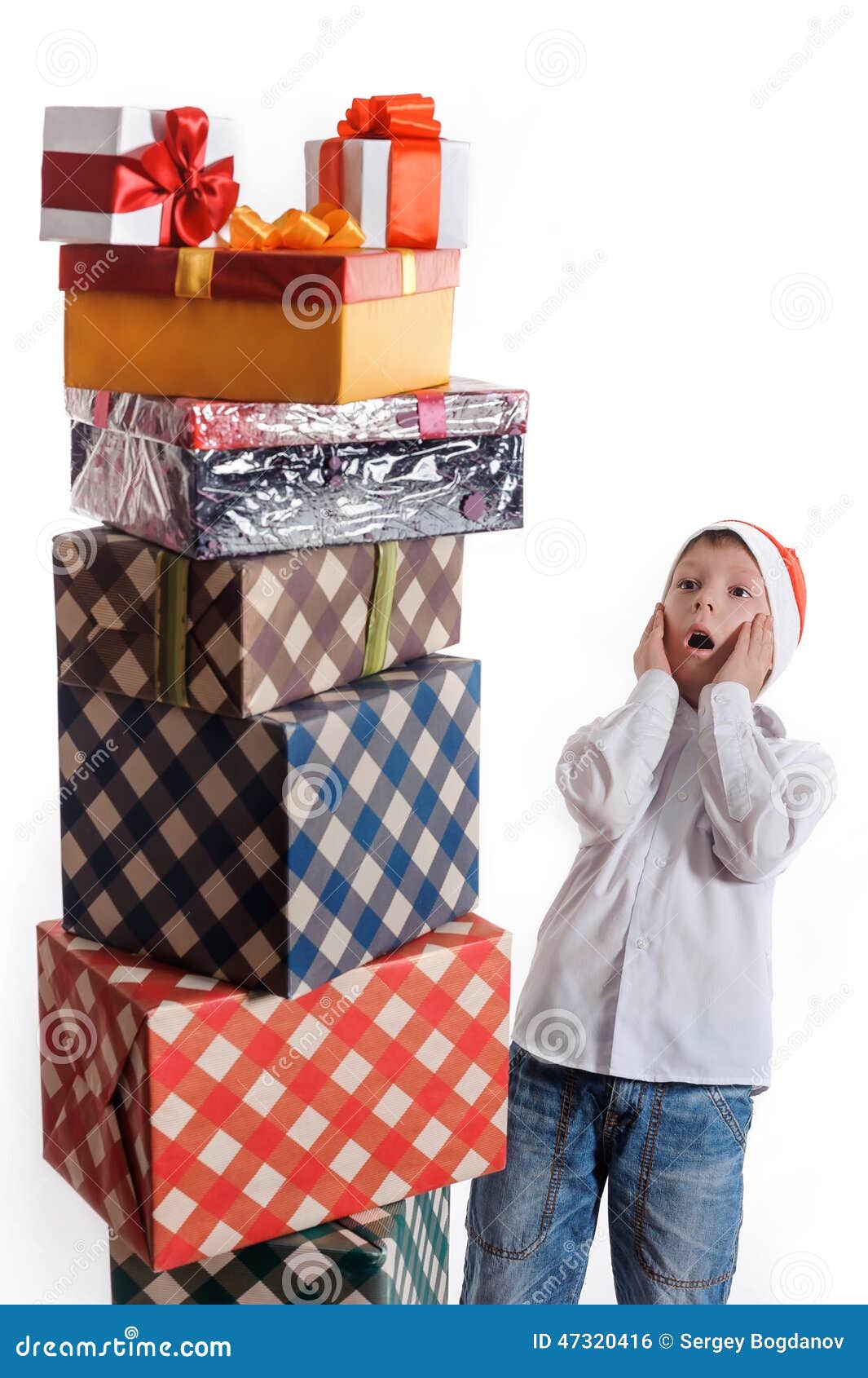 Surprised Boy and Christmas Presents Stock Photo - Image of holding ...