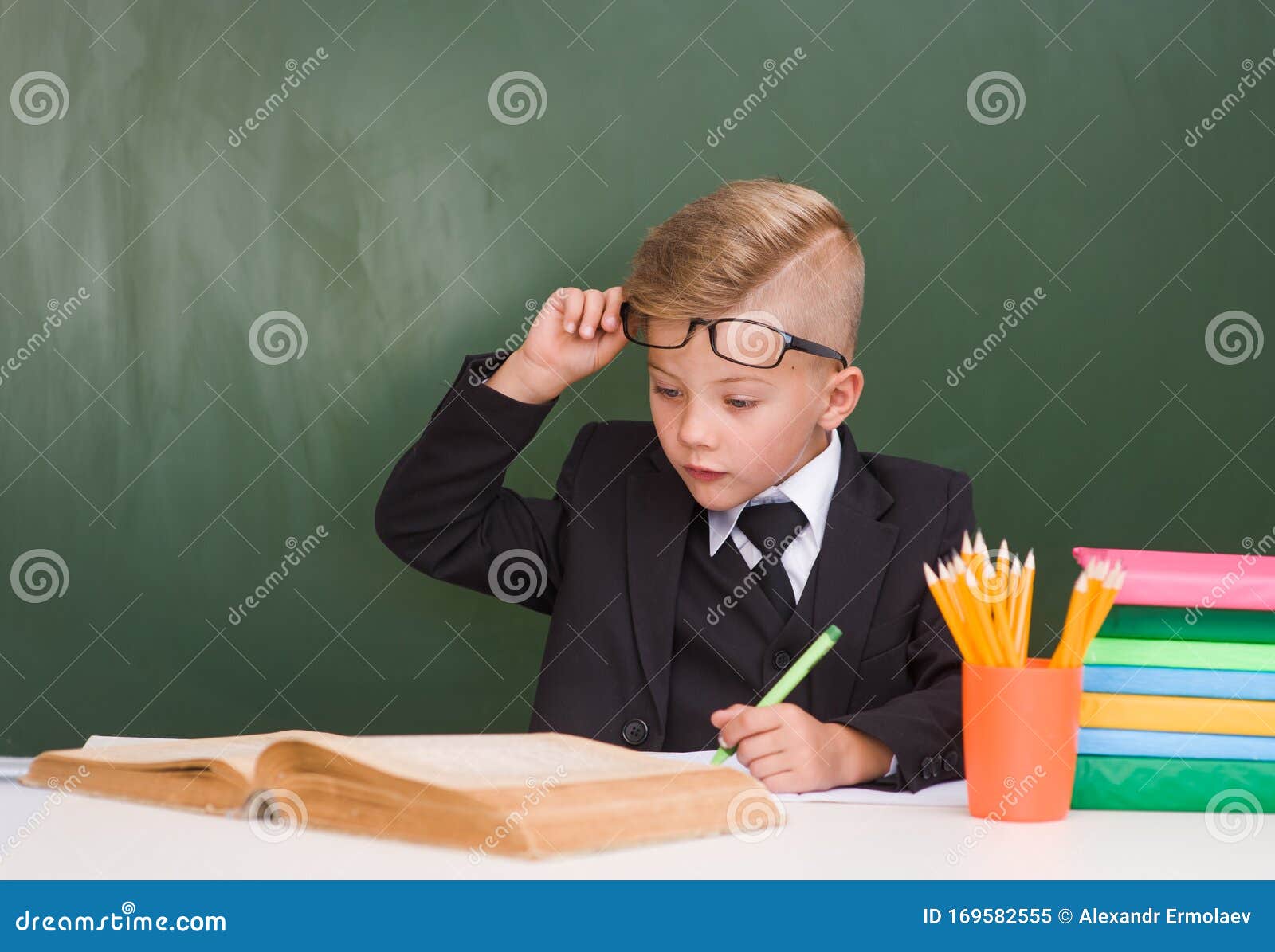 Surprised Boy Reading a Book Stock Image - Image of education, book ...