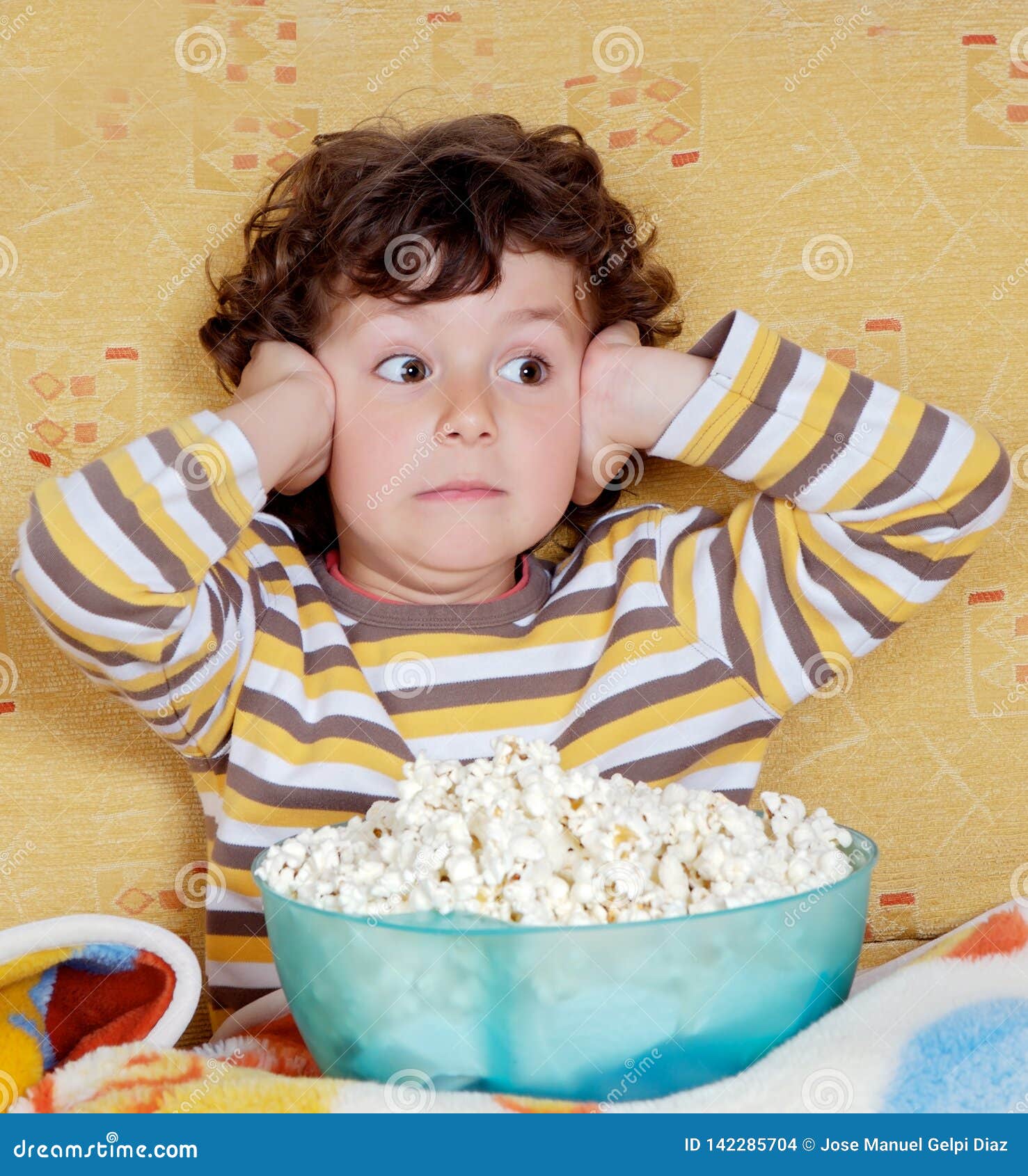 Surprised Child with a Bowl Full of Popcorn Stock Photo - Image of ...