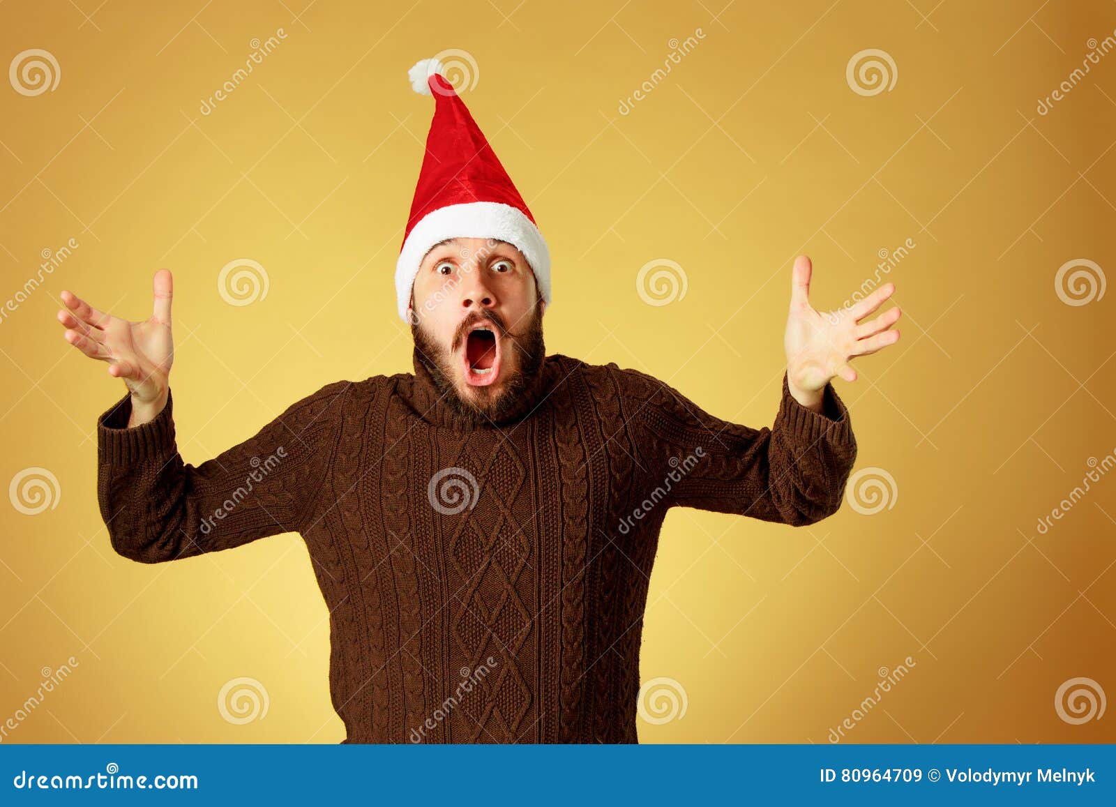 Surprised Christmas Man Wearing a Santa Hat Stock Image - Image of ...