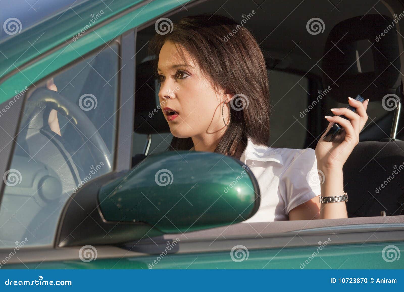 Surprised female in car stock photo. Image of calling - 10723870