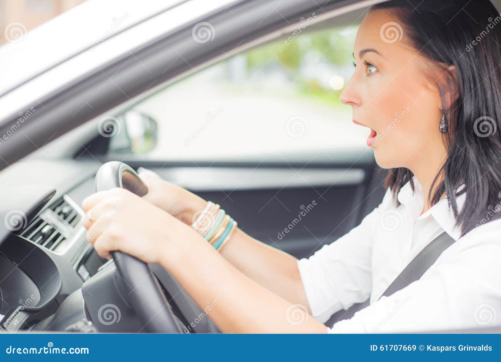 Surprised female driver stock image. Image of expression - 61707669