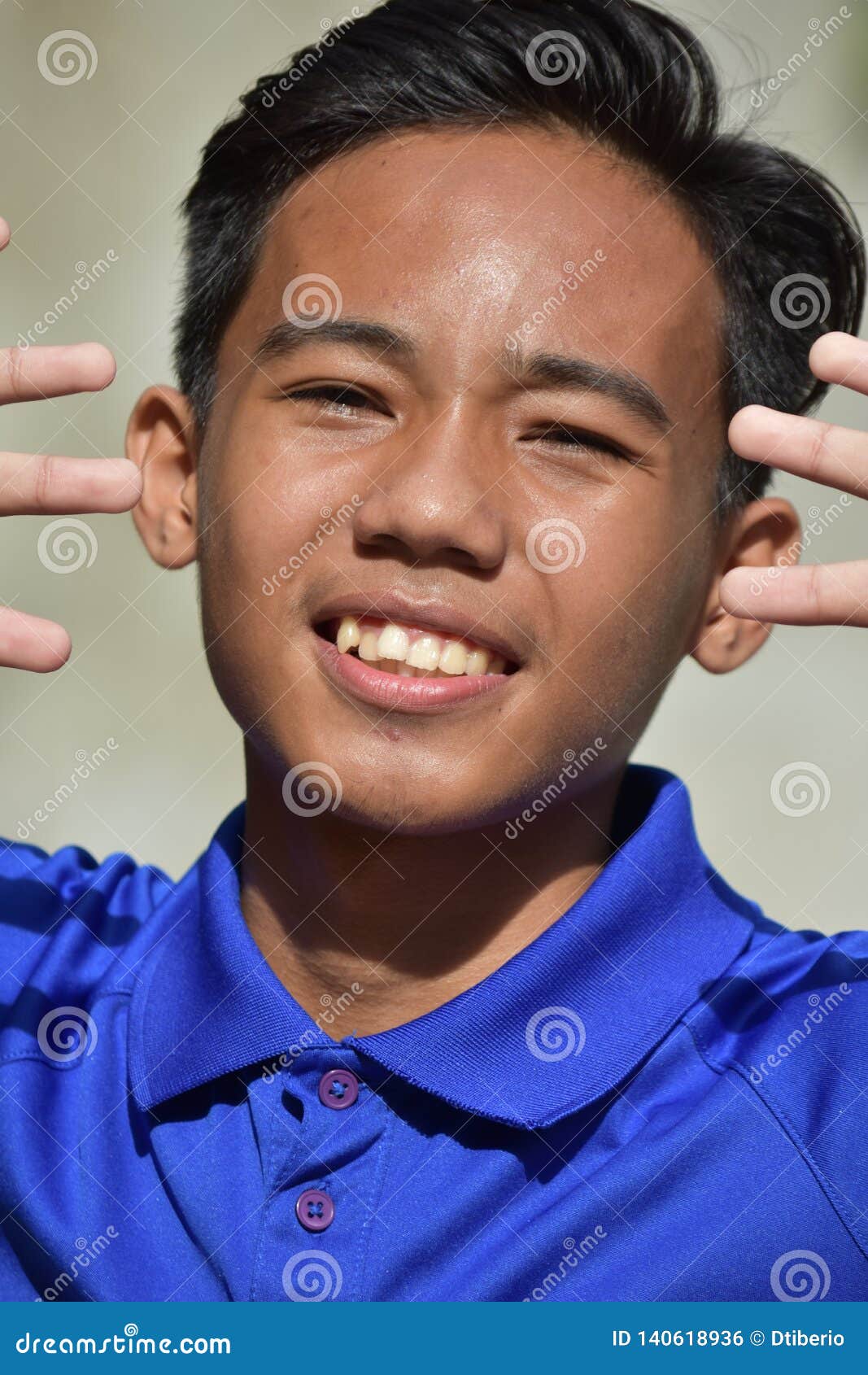A Surprised Filipino Boy stock photo. Image of friend - 140618936