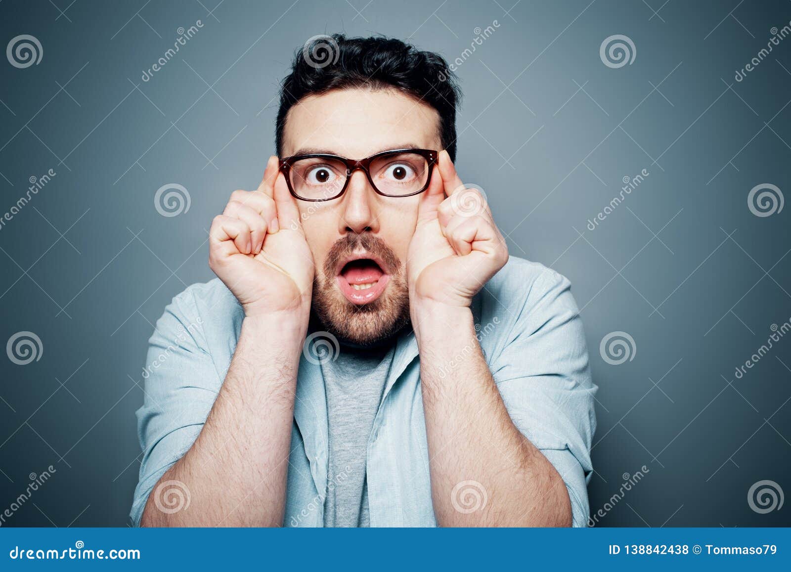 Surprised Funny Face Expression Man Showing Something Stock Photo ... Surprised Funny Face Expression Man Showing Something Stock Photo ...