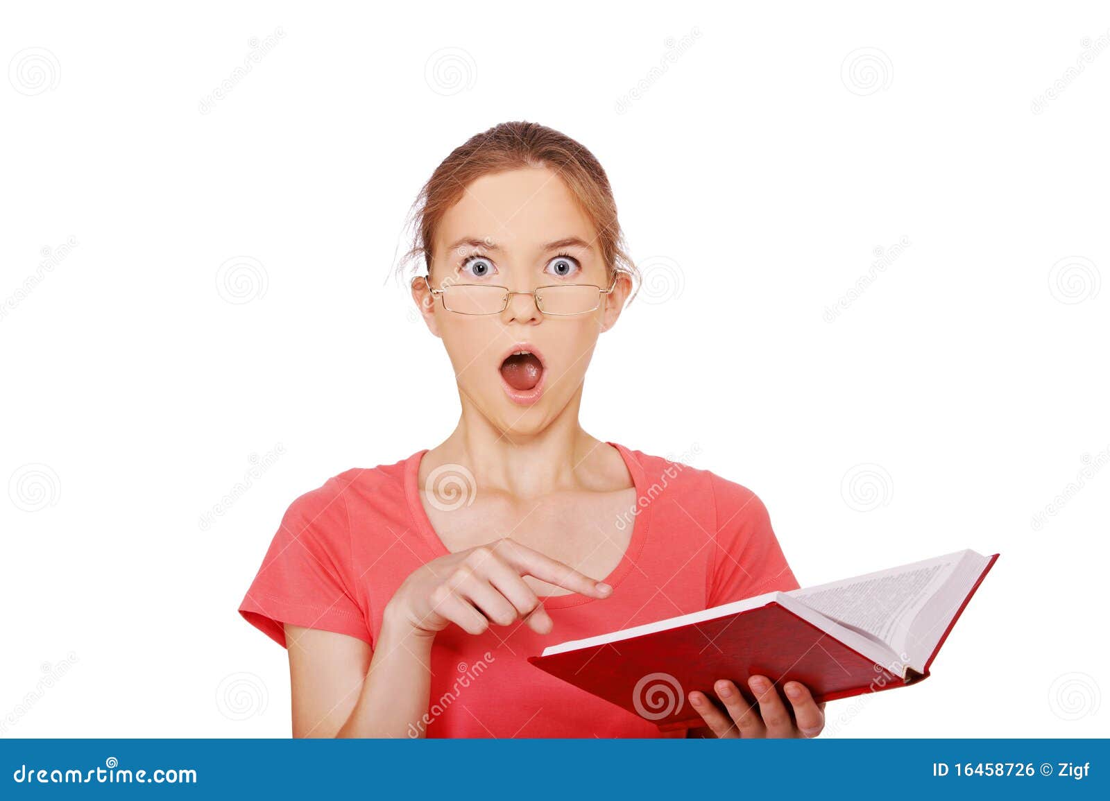 Surprised girl with book stock photo. Image of bright - 16458726