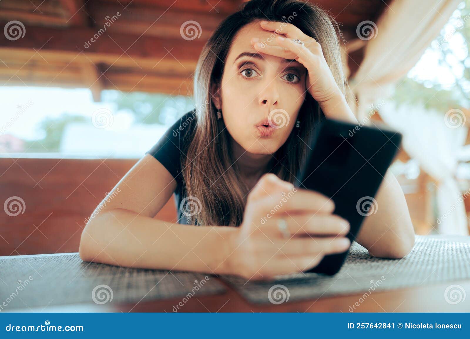 Surprised Girl Receiving A Strange Text Message Stock Image Image Of