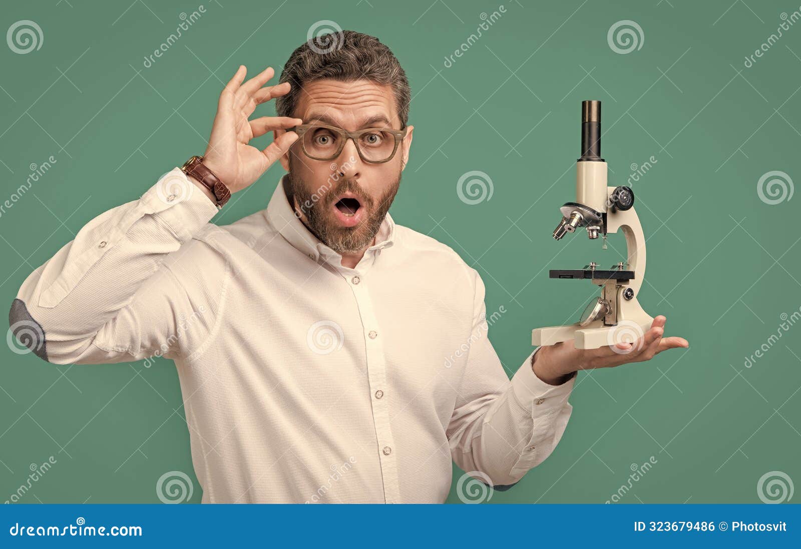 Surprised Man with Invention Microscope Isolated on Blue Background ...