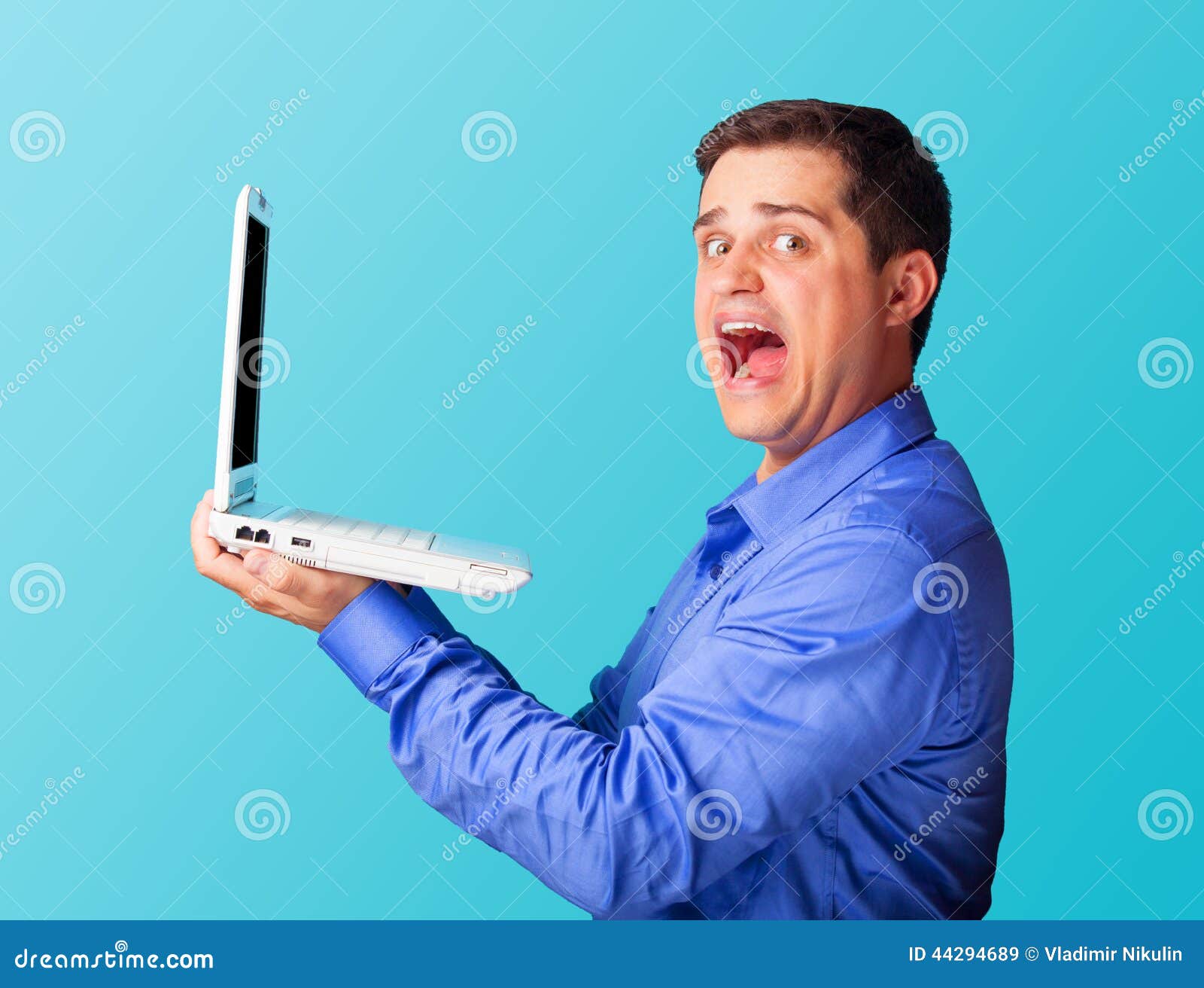 Surprised man with laptop stock image. Image of portrait - 44294689