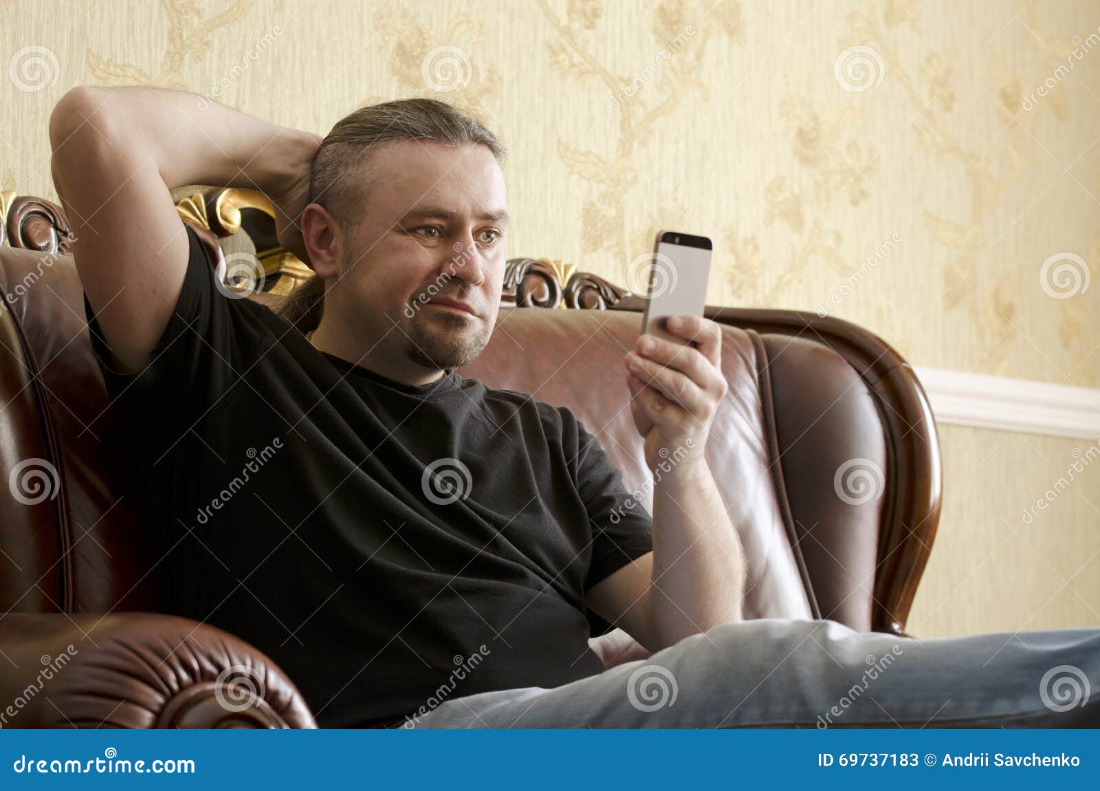 Surprised Man Looking at Cell Phone Stock Image - Image of expression ...