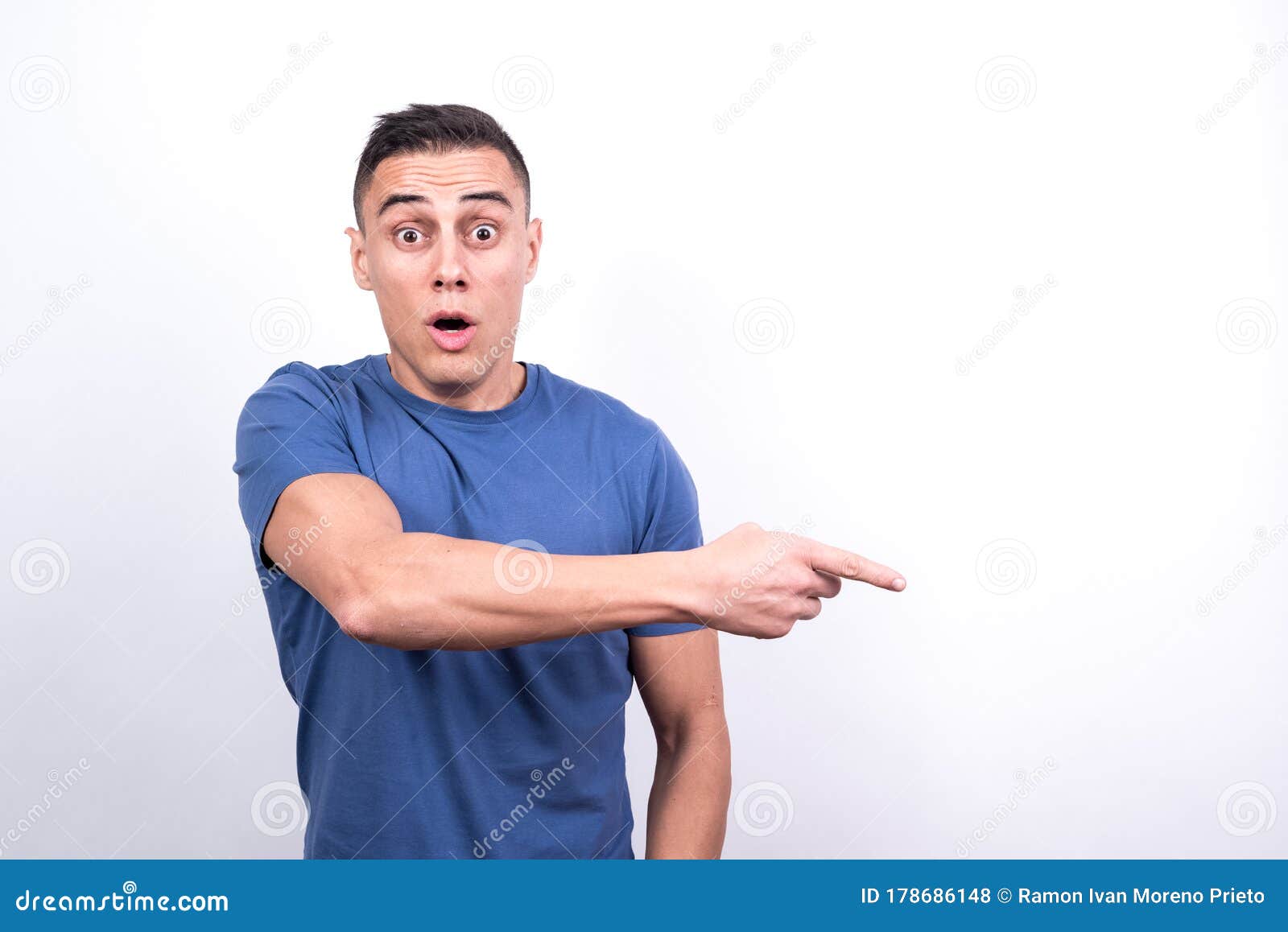 Surprised Man Pointing To Copy Space Stock Photo - Image of single ...