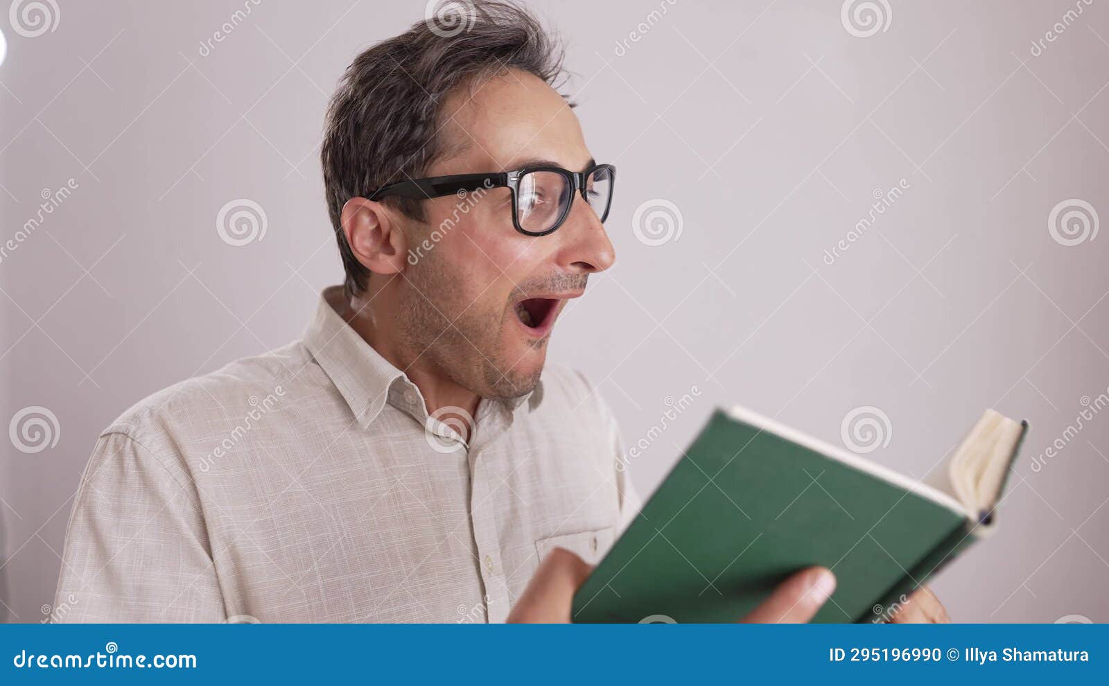 Surprised Man Reading a Book. Stock Footage - Video of student, learn ...