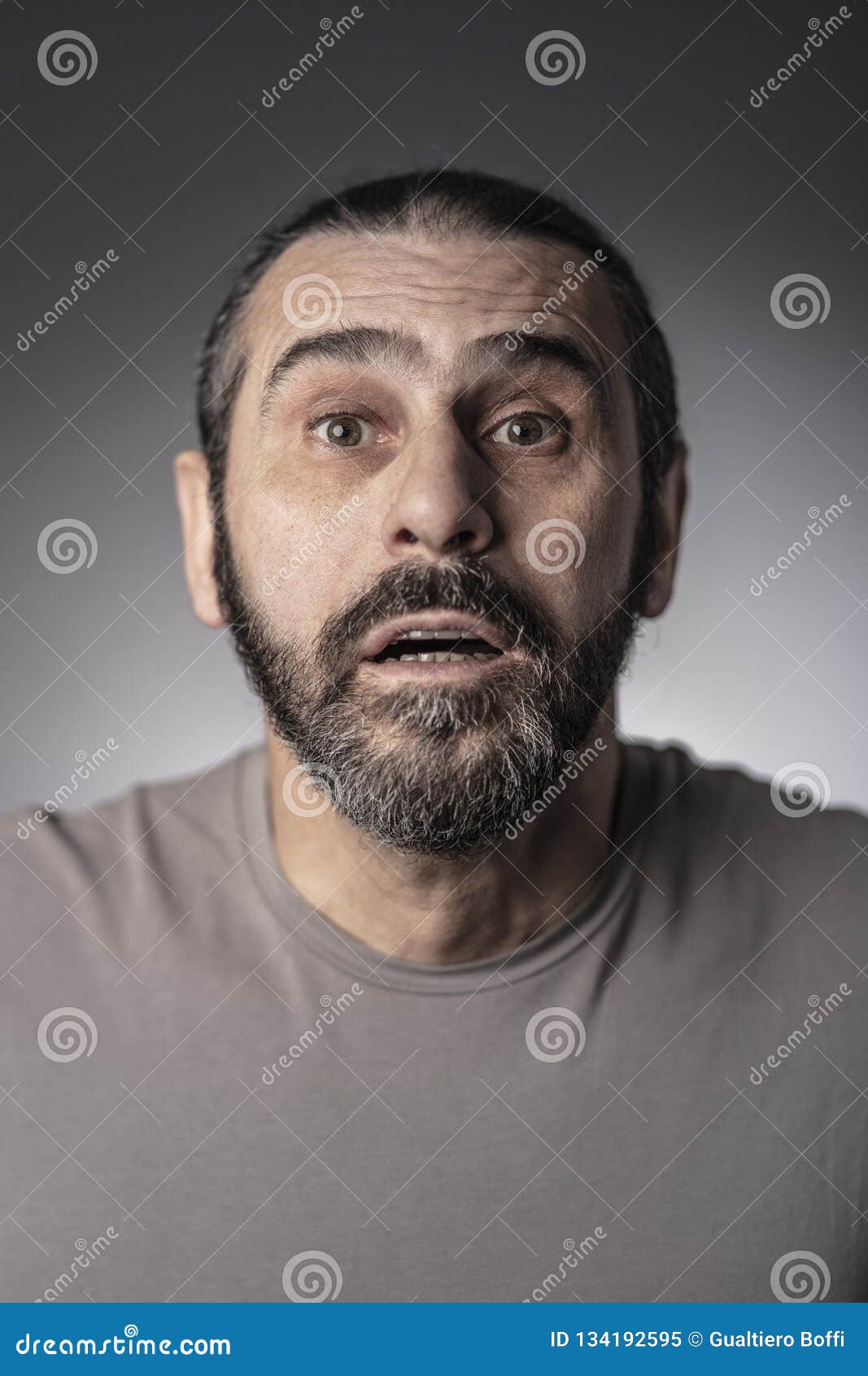 Surprised man studio shot stock image. Image of amazed - 134192595